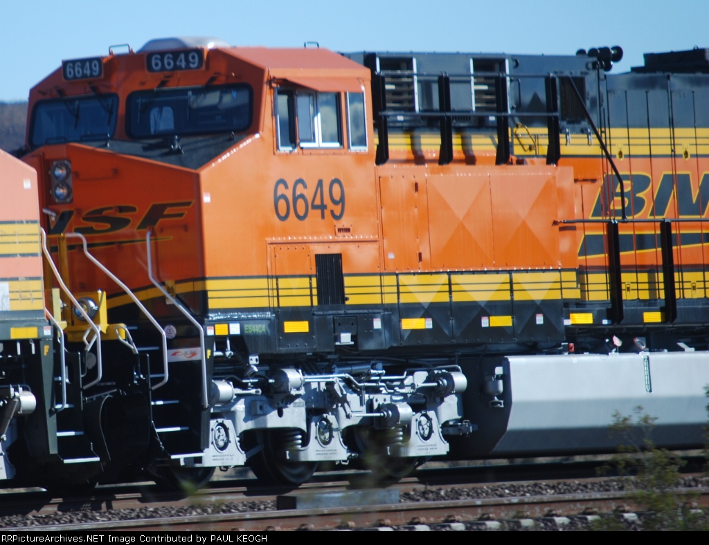 BNSF 6649 as she rolls eastbound into the rising sun.